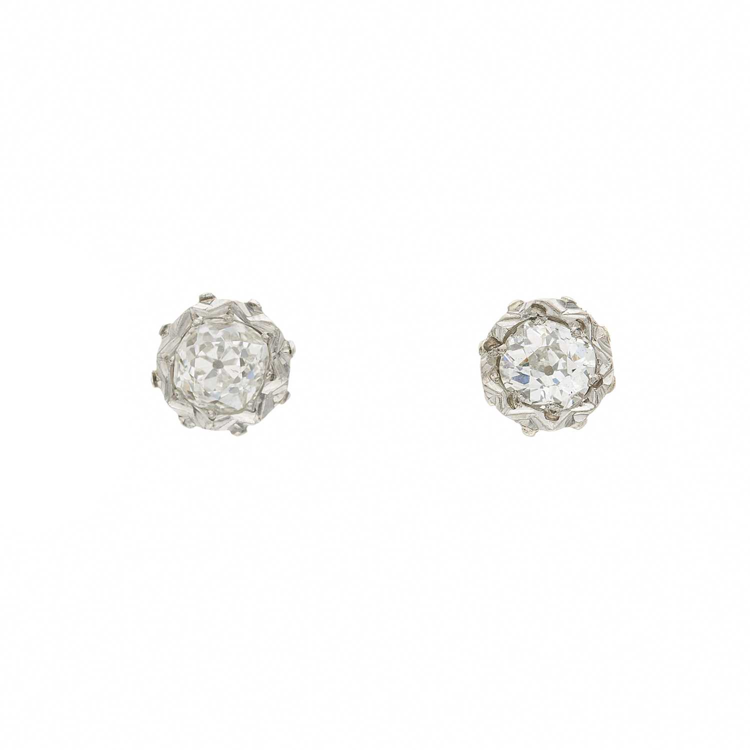 Lot 21 - A pair of old-cut diamond single-stone stud