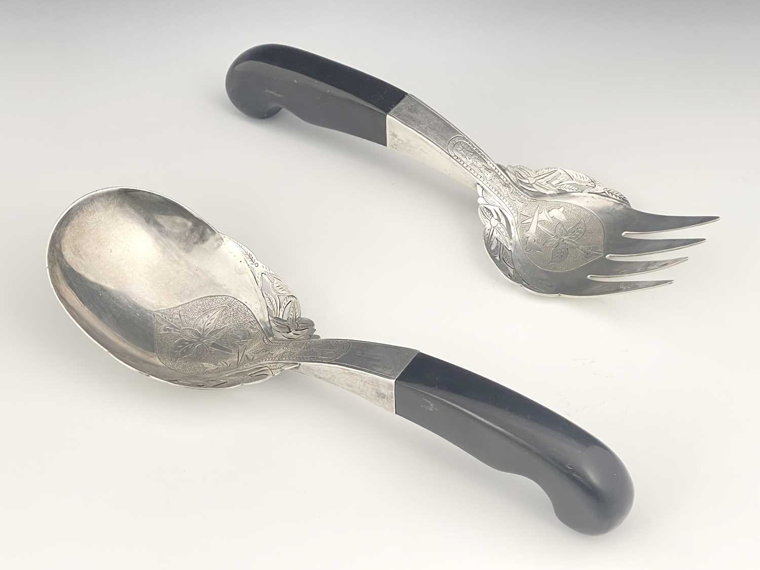 Lot 3 - A pair of Persian silver and horn handled