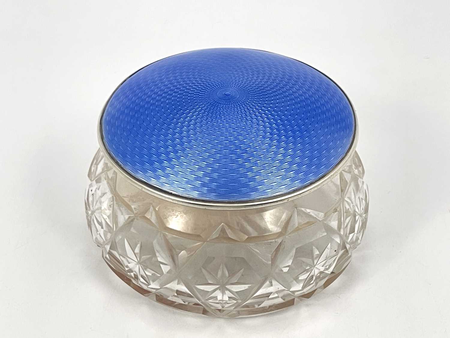 Lot 45 - A George V silver and enamelled cut glass box