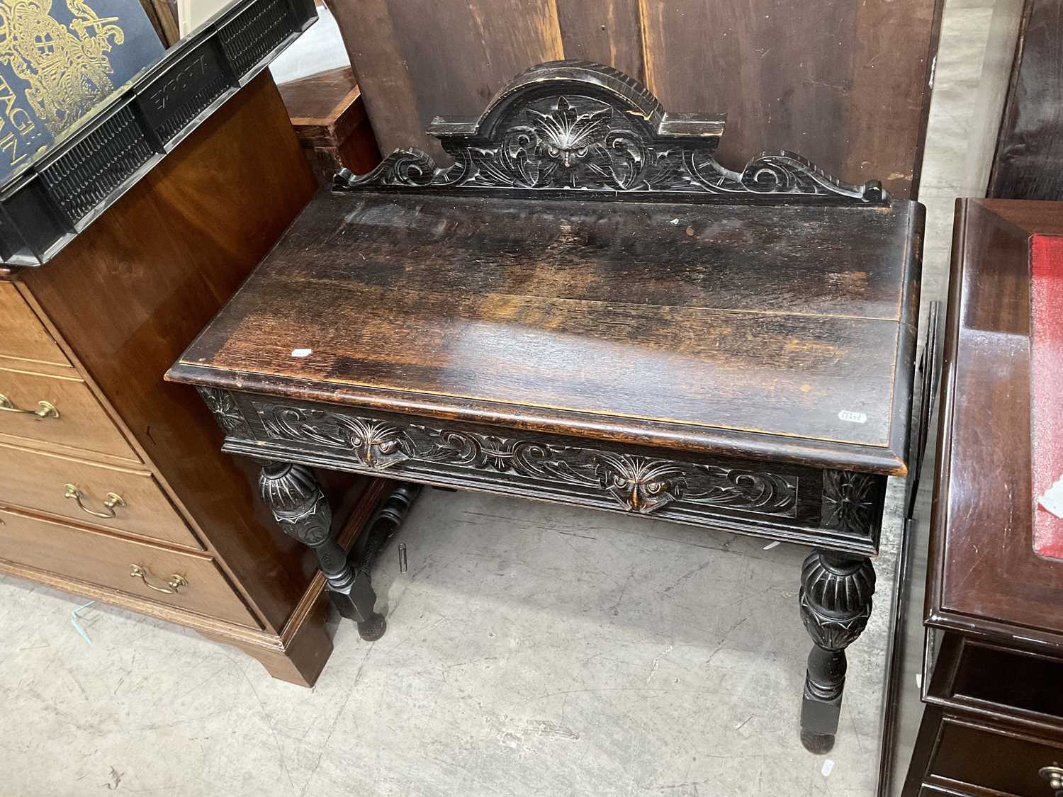 Lot 959 - A Victorian oak grotesque carved single