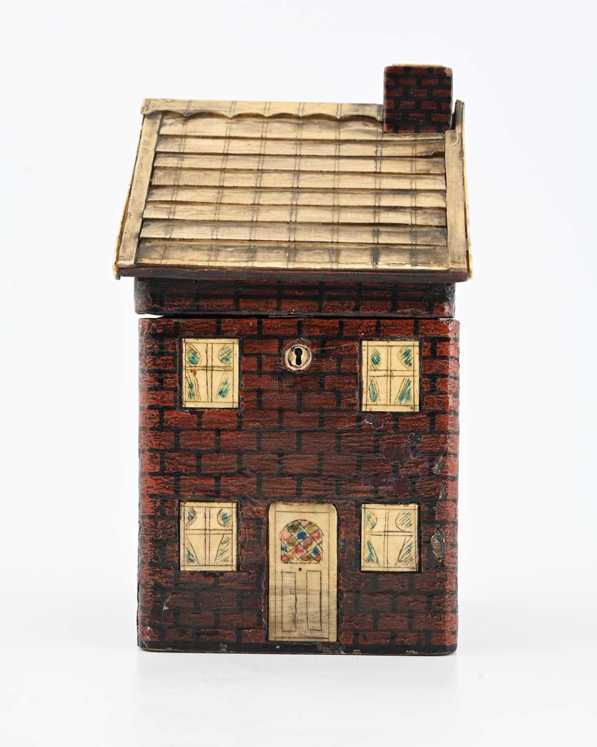 Lot 324 - A George III novelty tea caddy, circa 1810,