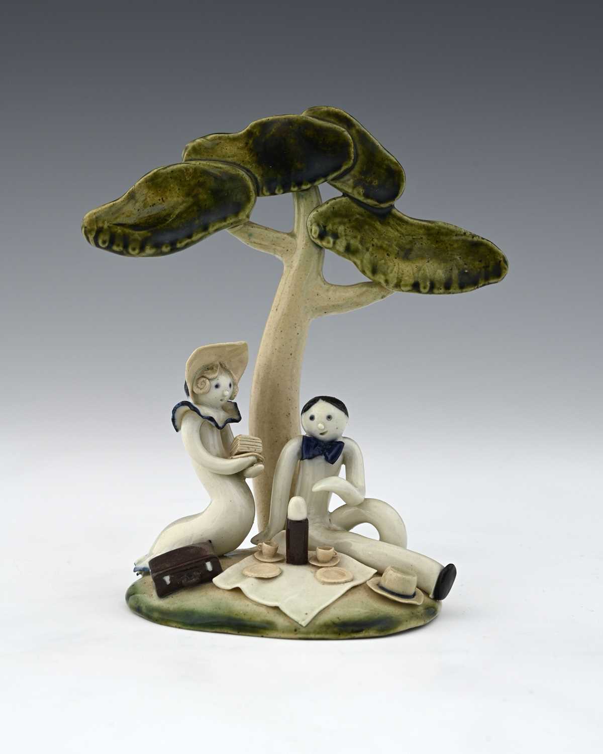 Lot 634 - William Ruscoe, an art pottery figure group,