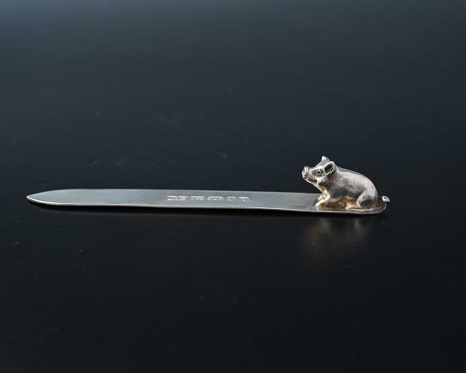 Lot 410 - An Elizabeth II novelty silver bookmark, the