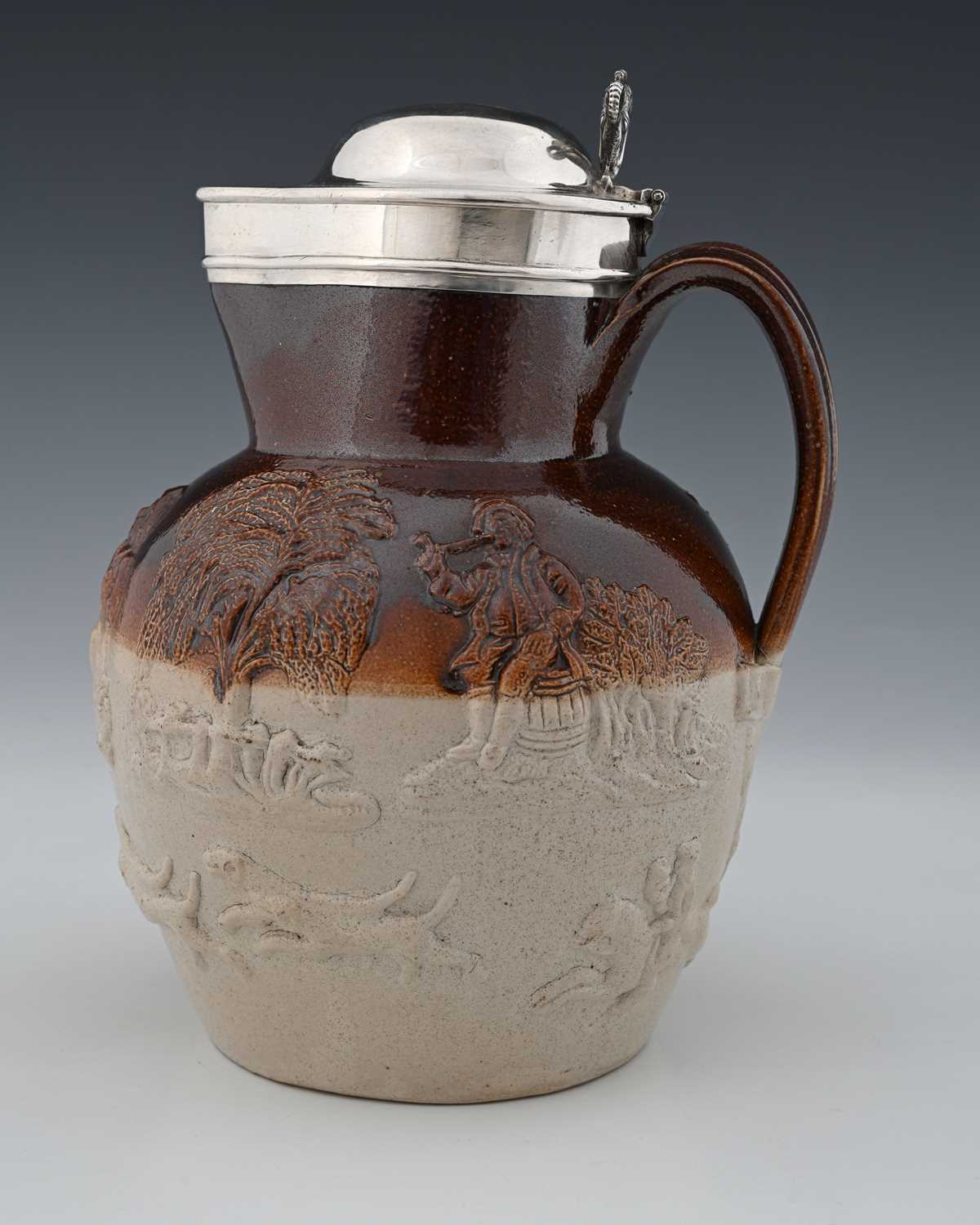 Lot 249 - An early Victorian silver-mounted stoneware