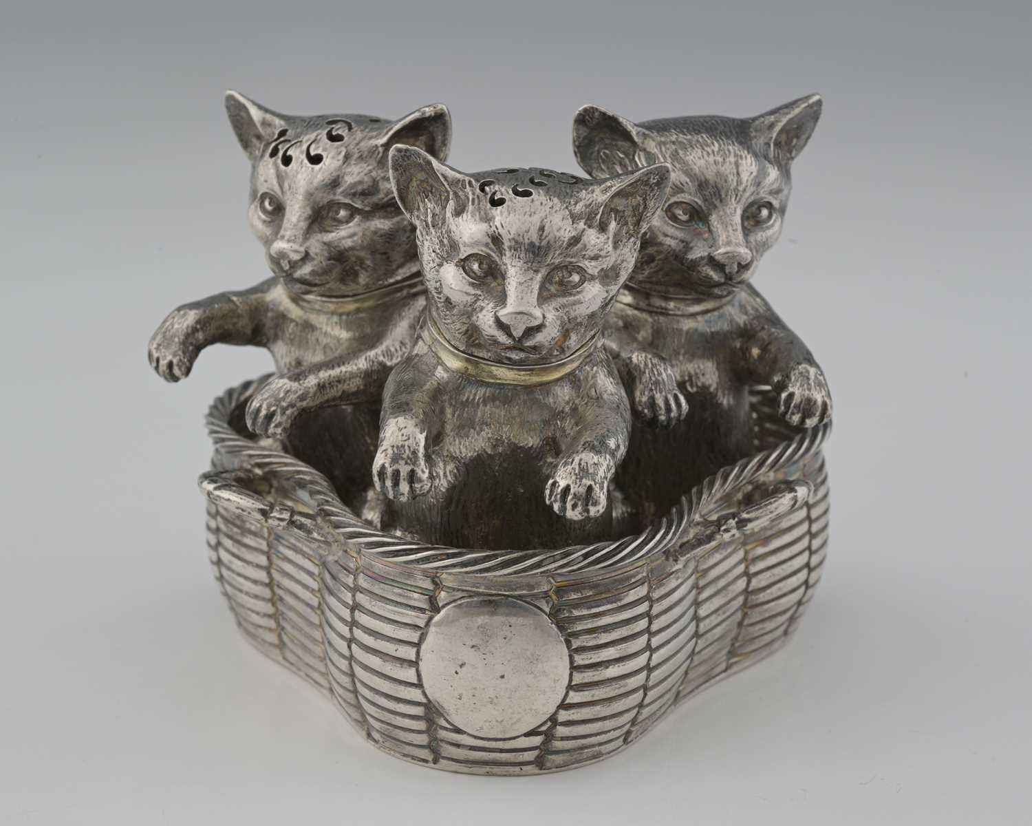 Lot 217 - A George V silver novelty zoomorphic cruet,