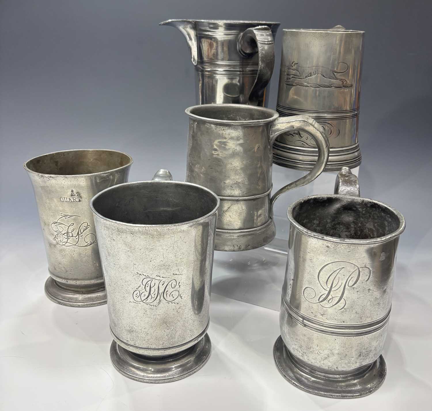Lot 367 - A George I style pewter mug, Watts & Harton,