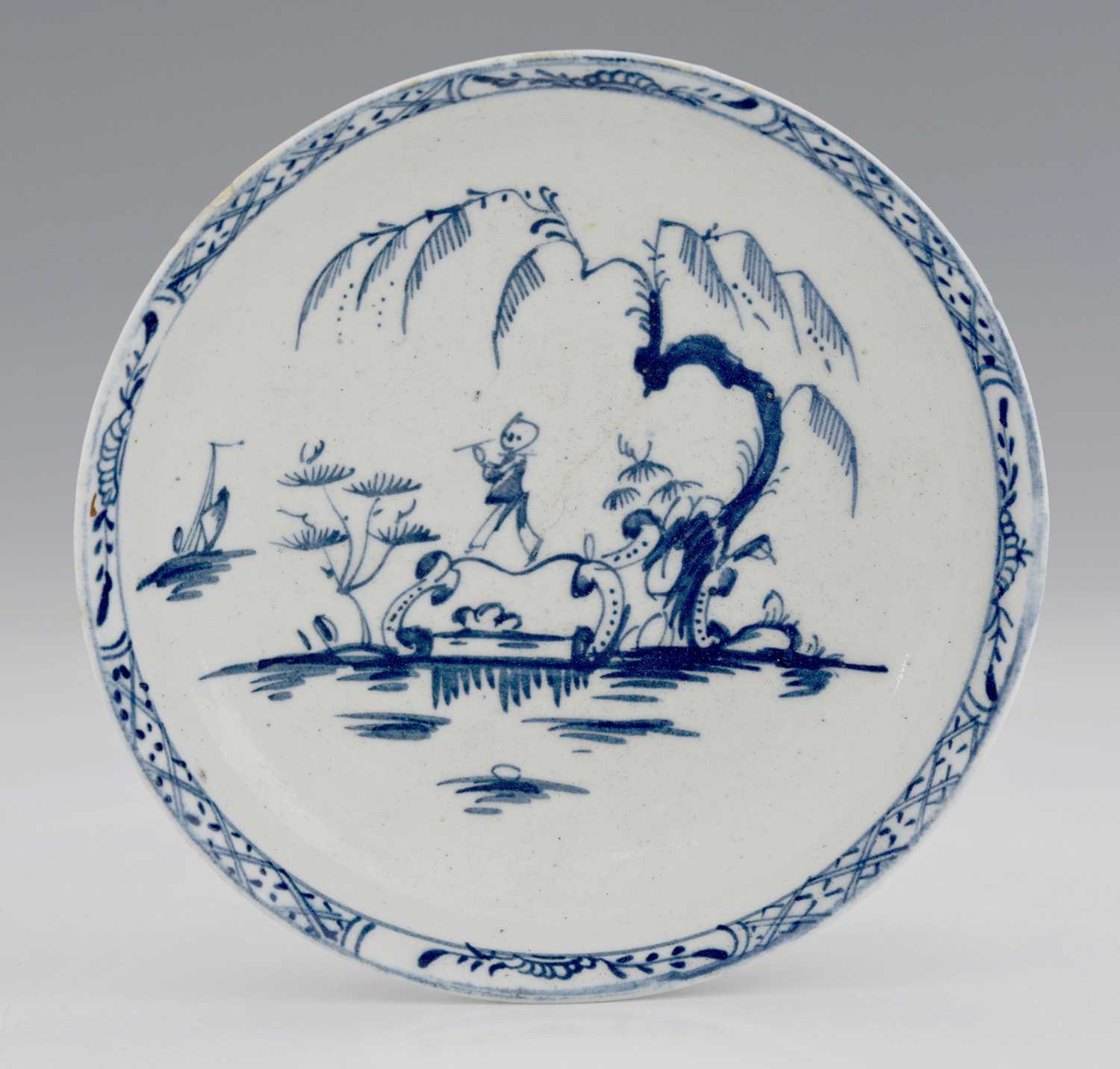 Lot 713 - Lowestoft, a blue and white porcelain saucer,