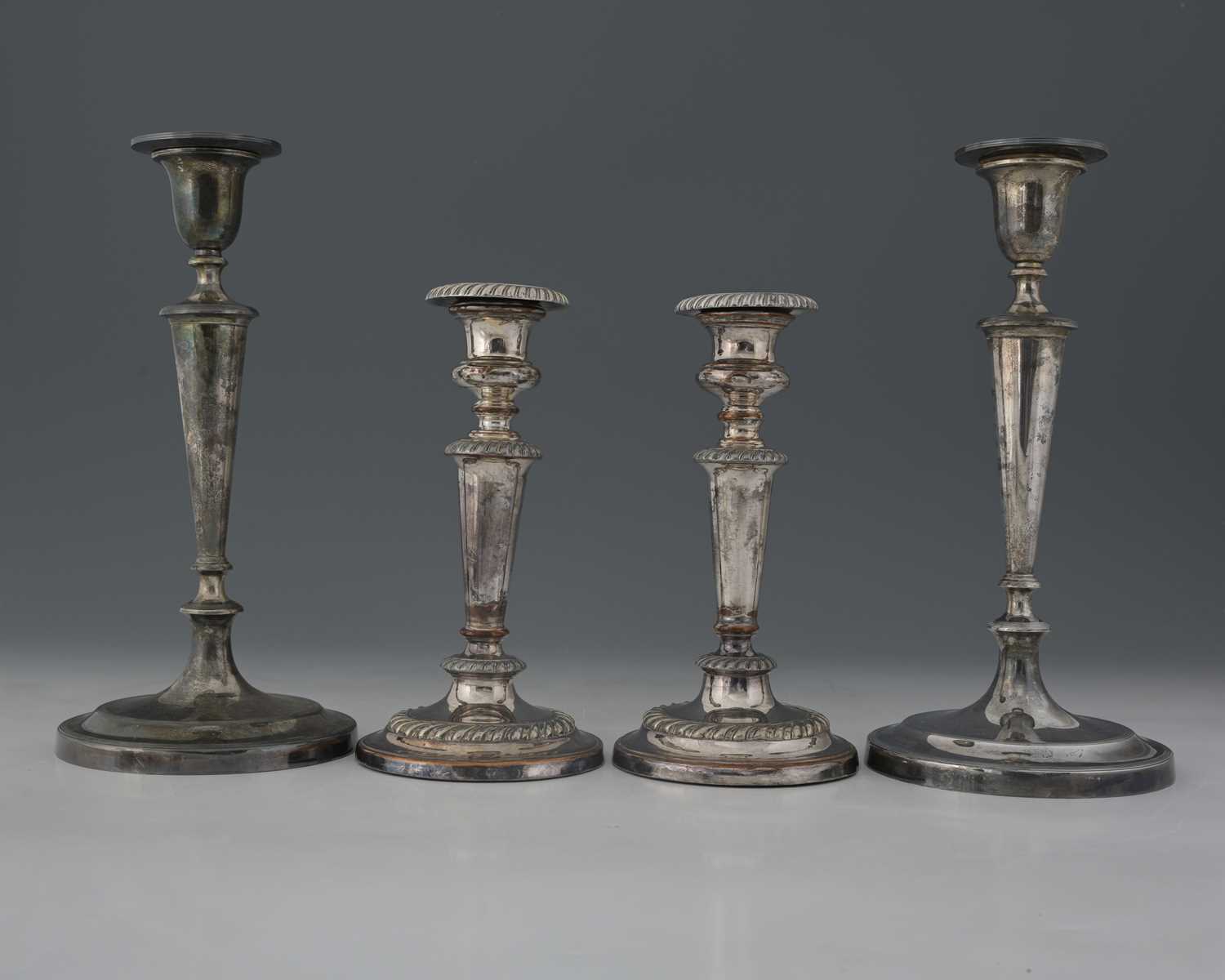 Lot 113 - A pair of Victorian silver candlesticks, by